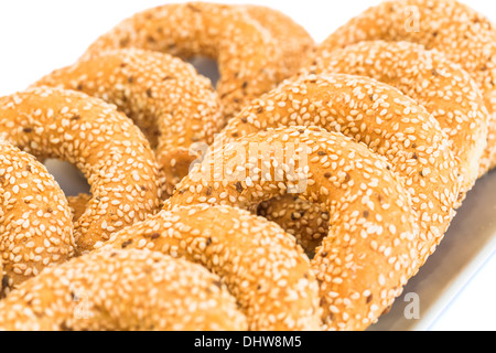 Round rusks with sesame seeds on tray Stock Photo - Alamy