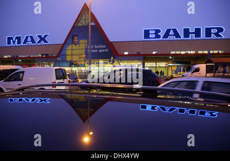 Rostock, Germany. 15th Nov, 2013. The neon signs of the hardware store ...