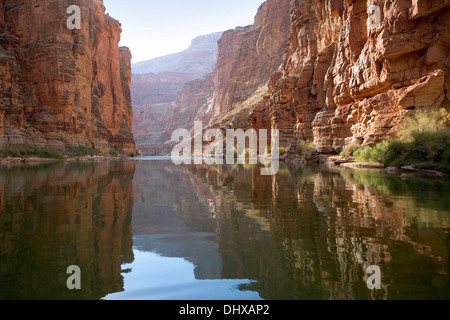 Grand Canyon landscape with vast cliffs and deep valleys under a clear ...
