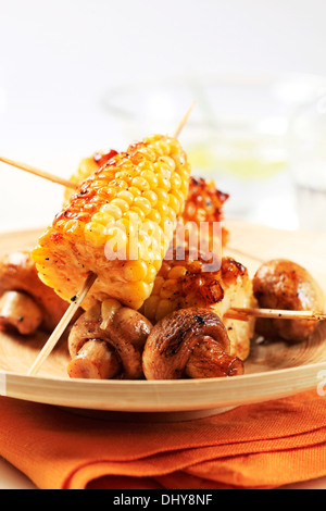 Grilled sweet corn cobs and button mushrooms Stock Photo - Alamy