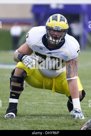 Michigan offensive lineman Taylor Lewan answers a question during a ...