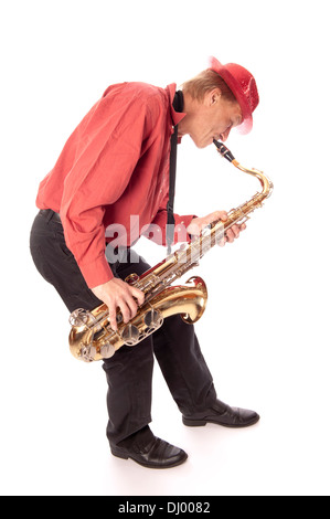 Brass tenor saxophone with silver valves and pearl buttons on a stand ...