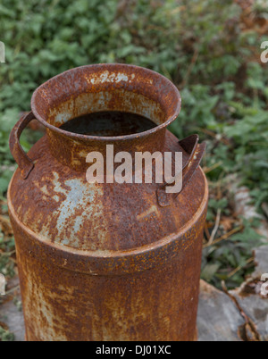 old rusted metal milk barrel Stock Photo - Alamy