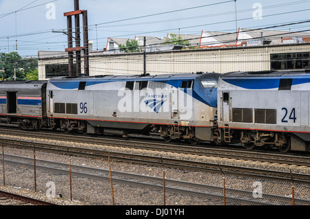 Amtrak P42DC Locomotive No 24 passing MARC MP36PH-3C Locomotive No 22 outside Union Station ...