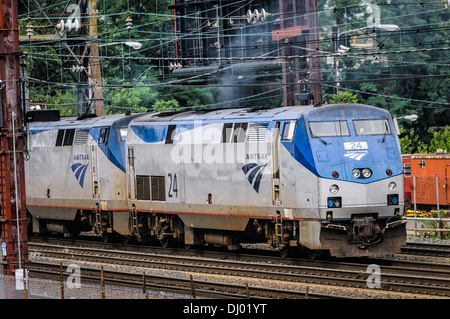 Amtrak P42DC Locomotive No 24 passing MARC MP36PH-3C Locomotive No 22 outside Union Station ...