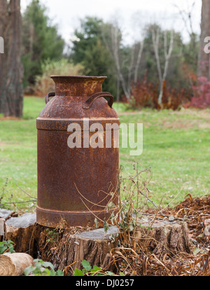 old rusted metal milk barrel Stock Photo - Alamy