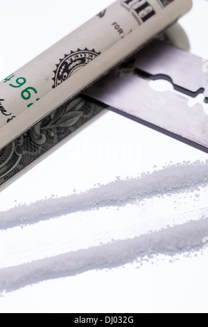 cocaine lines on mirror with razor blade drugs objects Stock Photo - Alamy