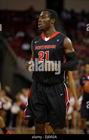 Cal State Northridge forward Stephen Maxwell (21) attempts a shot ...