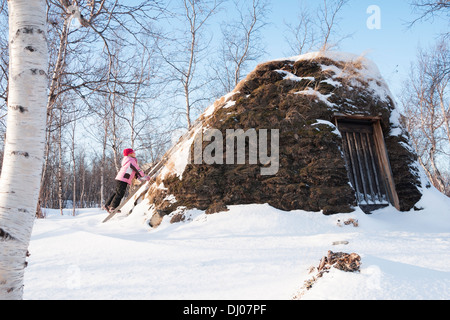 Sami culture: a a turf hut (darfegoahti) in a Sami Camp in Abisko ...