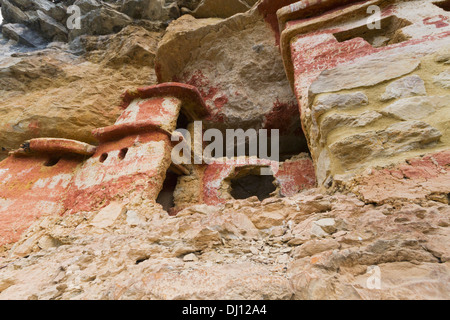 Chullpas of the Chachapoya culture nestled in the limestone cliffs of ...
