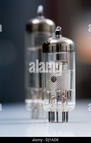 Old electronic tubes lamp, transistor and radio tube isolated on white ...