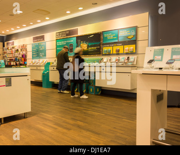 The EE mobile phone shop store in Bath , Somerset , England , Britain ...