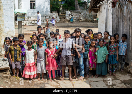 Group of indian small children boys kids girls returning from school ...