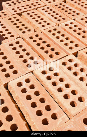 A large stack of red bricks Stock Photo - Alamy