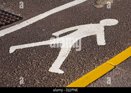 Painted Walking Pedestrian Figure on street in London England UK Stock ...