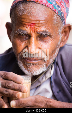 Nepalese man drinking chai in Kathmandu, Nepal Stock Photo - Alamy