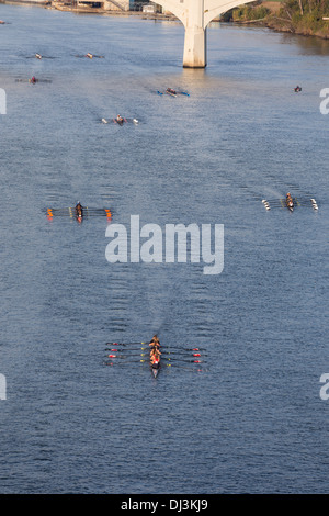 Rowers row up the Tennessee River in Chattanooga Tennessee during the ...