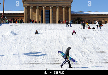 People sled at Philadelphia Art Museum steps during a winter storm in ...