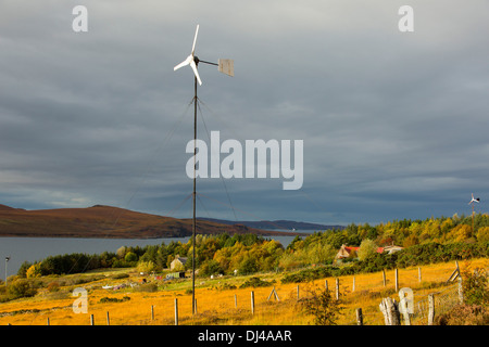 A wind turbine in Scoraig, in NW Scotland, one of the most remote ...
