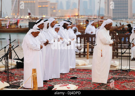 DOHA, Qatar, Nov 21, 2013:A Qatari folk troupe performs traditional ...