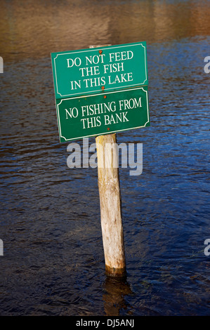 Do not feed fish sign Stock Photo - Alamy