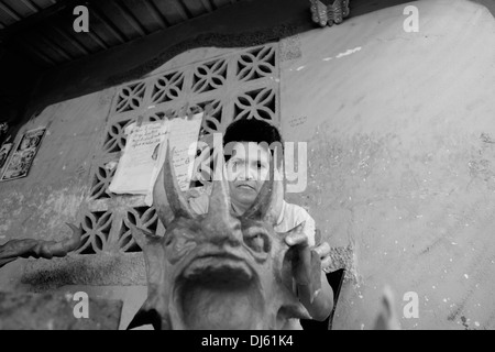 A traditional devil mask maker in his workshop in Villa de los Santos ...