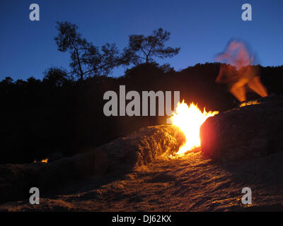 The so called eternal flame flickers between some rocks in the national ...