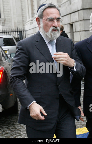The Chief Rabbi Sir Jonathan Sacks (centre) after receiving his ...