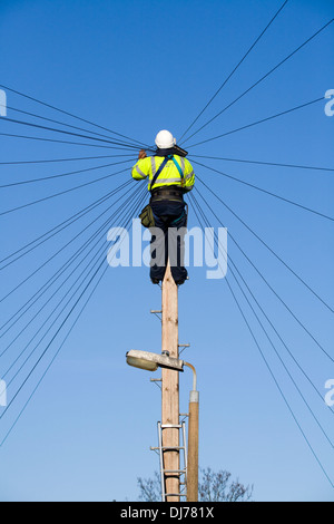 BT plc Telecom engineer (British Telecom PLC) installs a new domestic ...