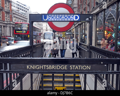 Bus stop. Knightsbridge station. The shopping street. Brompton Road is ...