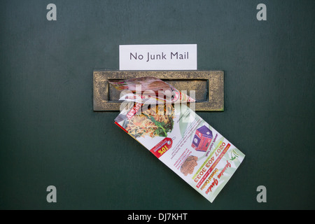 Junk Mail in a Letter Box, UK Stock Photo - Alamy