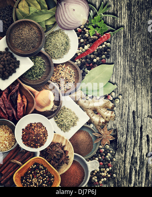 dried spices ginger in bowl on a brown background Stock Photo - Alamy