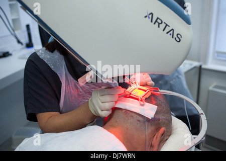 ARTAS robotic hair transplant machine being used at Farjo Hair ...