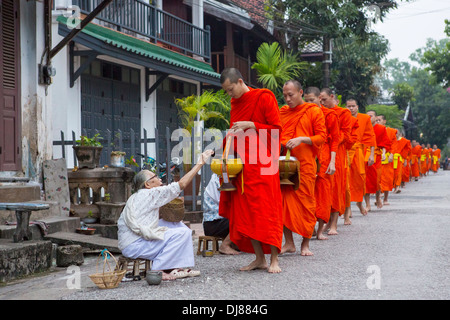 Alms giving ceremony, Luang Prabang, Laos. Buddhist monks, traditional ...