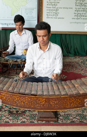Musician playing a roneat, traditional Cambodian xylophone, Siem Reap ...
