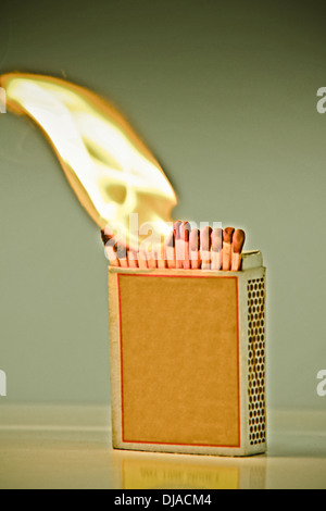 Box of matches with lighted Matchstick Stock Photo - Alamy