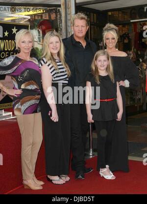 Gary LeVox with wife Tara and their children Rascal Flatts honored with ...