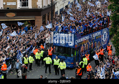 Chelsea's team members celebrate on a convertible bus their UEFA ...