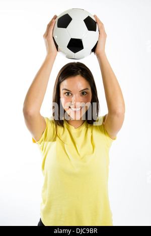 young woman holding soccer ball on her hand Stock Photo - Alamy