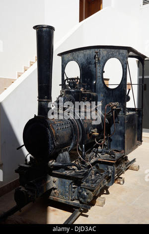 An ancient very small steam locomotive used in agriculture a hundred ...