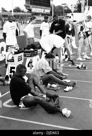 Athlete Linford Christie (centre) outside his Buckinghamshire home ...