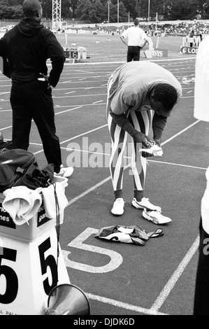 Athlete Linford Christie (centre) outside his Buckinghamshire home ...