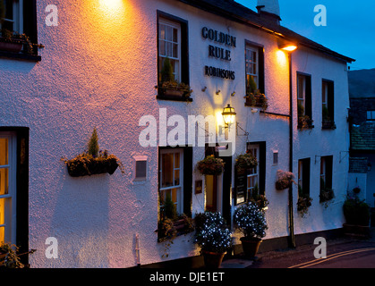 The shops of Ambleside at night, Lake District National Park, Cumbria ...