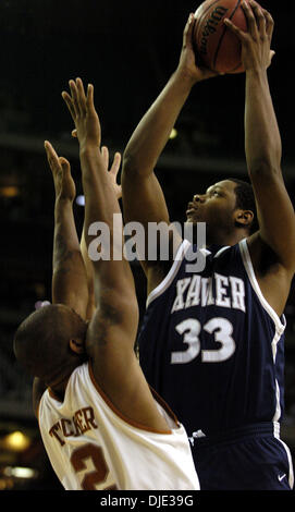 Mar 26, 2004; Atlanta, GA, USA; Xavier's LIONEL CHALMERS celebrates ...