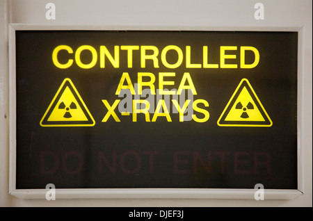 X ray controlled area sign Stock Photo - Alamy