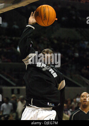 Oct 19, 2004; San Antonio, TEXAS, USA; Spurs' TIM DUNCAN lays on the ...