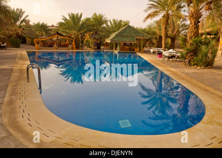 The swimming pool area of the Hotel Kasbah Xaluca in Erfoud, Morocco ...