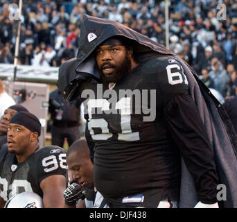 Oakland Raiders defensive tackle Gerard Warren (61) is shown during an ...