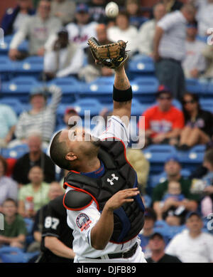 New York Mets' Ramon Castro swings for a three-run home run against the ...