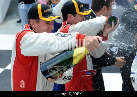 Race winning driver Charles Putman (left) of Fall-Line Motorsports car ...